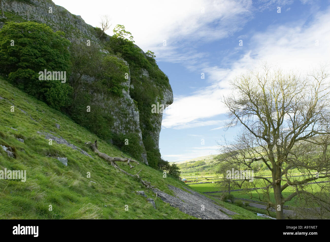 Beautiful scenic Wharfe Valley (flat sunlit fields), Kilnsey Crag (high ...