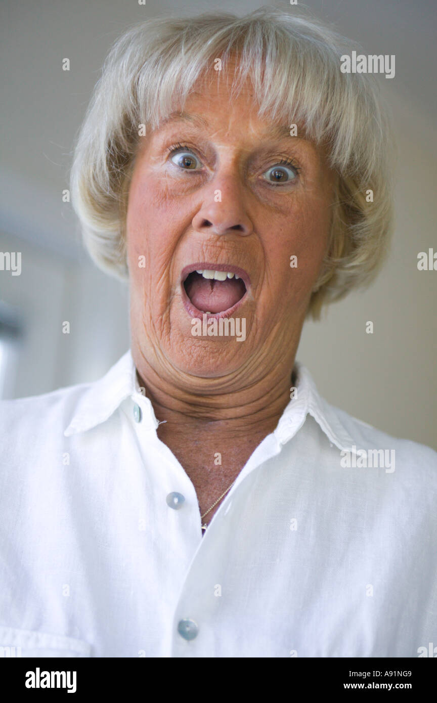 Senior Woman acting surprised Stock Photo - Alamy Senior Woman acting surprised Stock Photo - Alamy