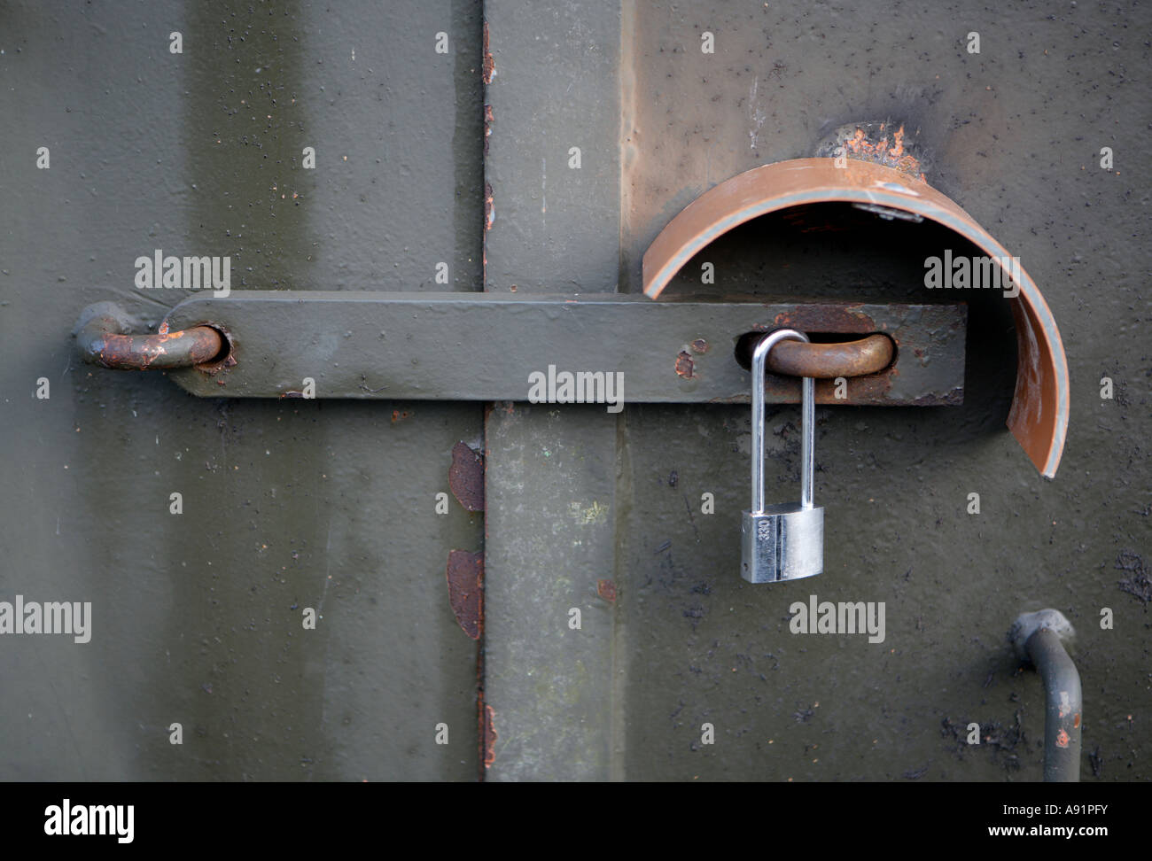 Padlock at a door Stock Photo - Alamy
