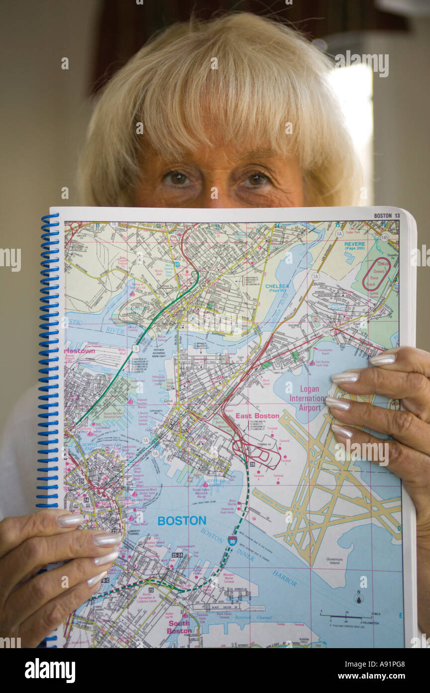 Senior Woman reading map Stock Photo - Alamy