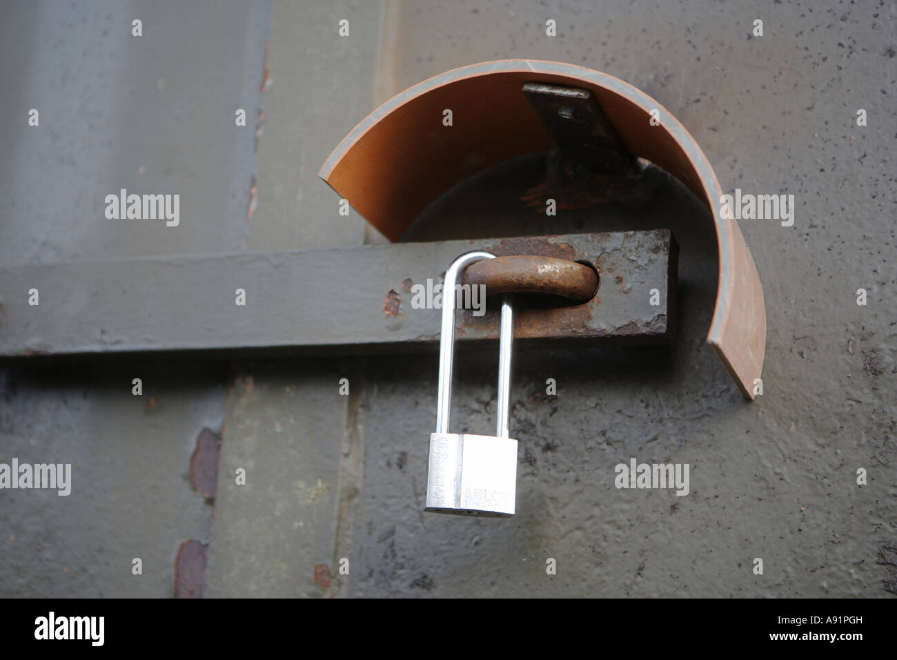 Padlock at a door Stock Photo - Alamy