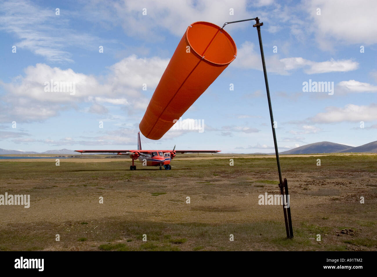 Falkland FIGAS aircraft and windsock Stock Photo - Alamy