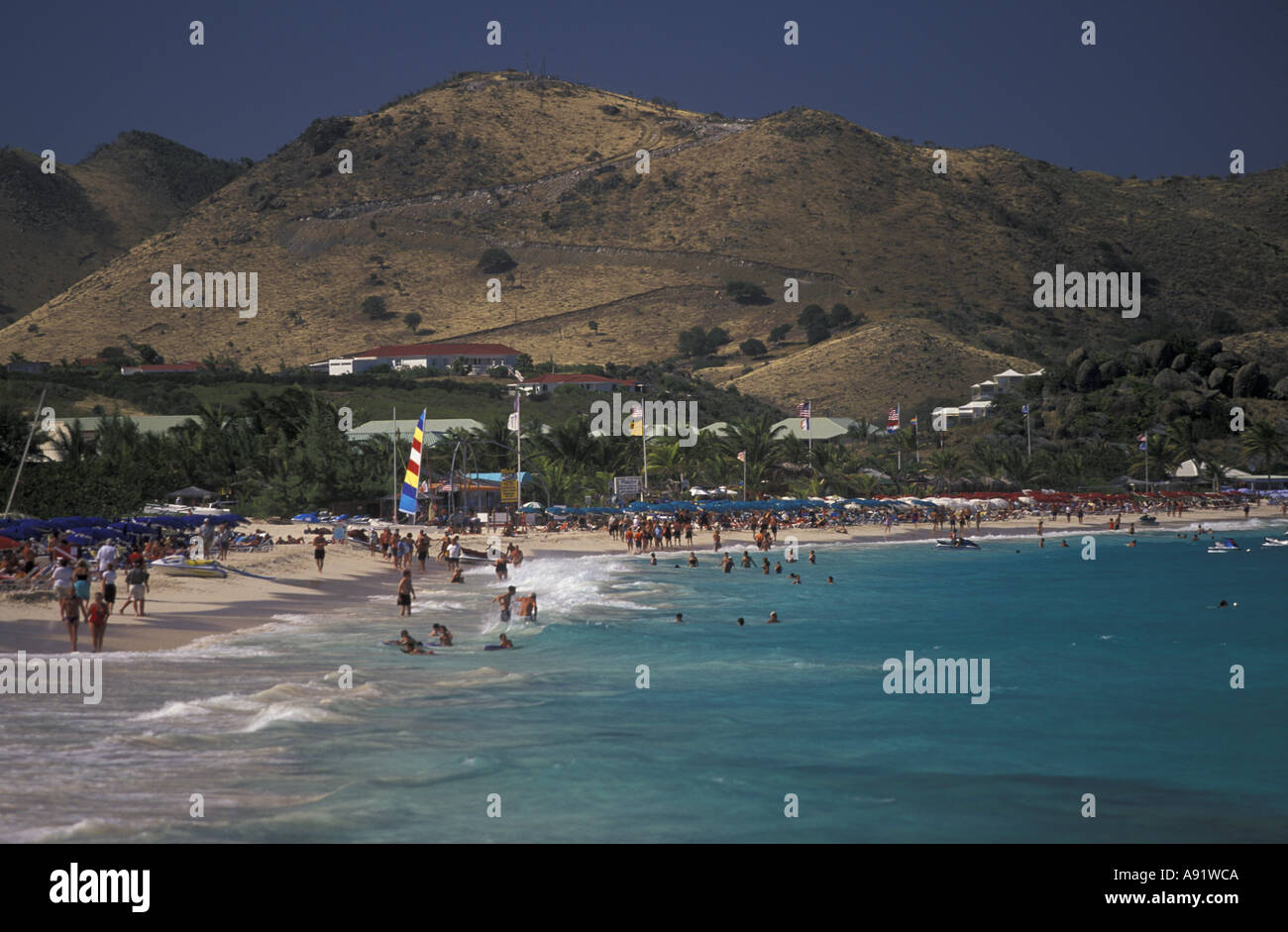 Caribbean, French West Indies, St. Martin. Orient Beach; beach and ...