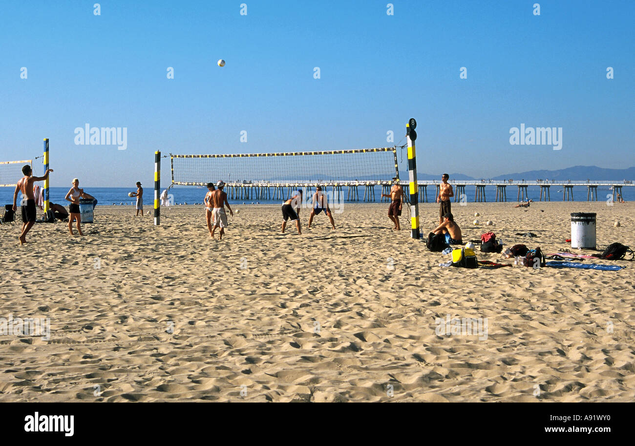 Playing volleyball on the beach is a popular activity in Southern ...
