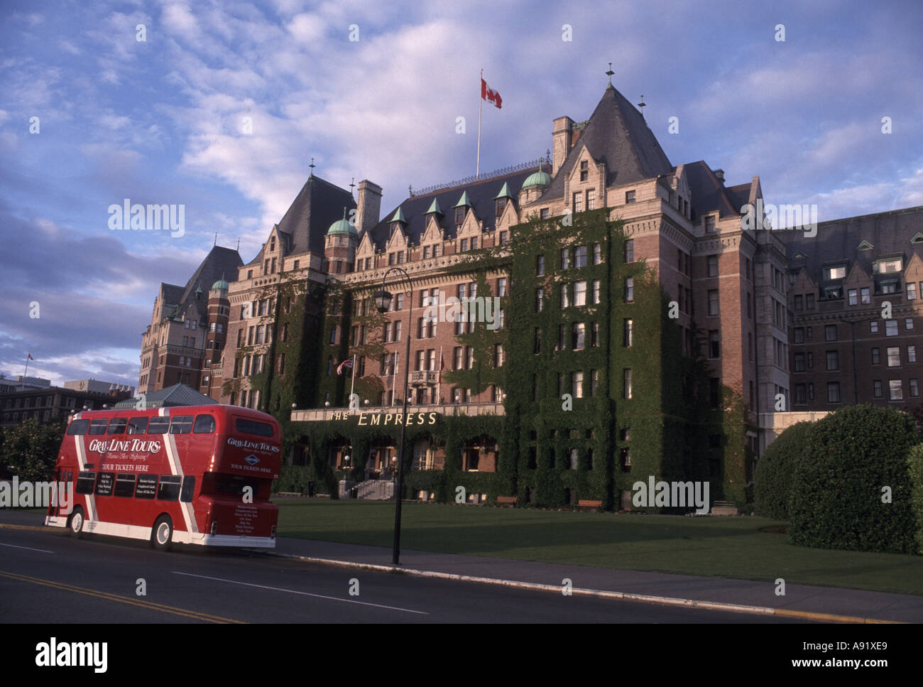 Canada, British Columbia, Victoria Double-decker bus passes in front of ...