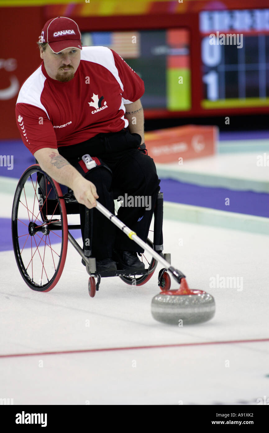 Team Canada skipper Chris Daw lines up a stone Stock Photo - Alamy