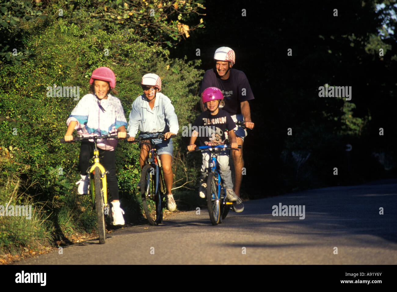 family on bike ride Stock Photo - Alamy