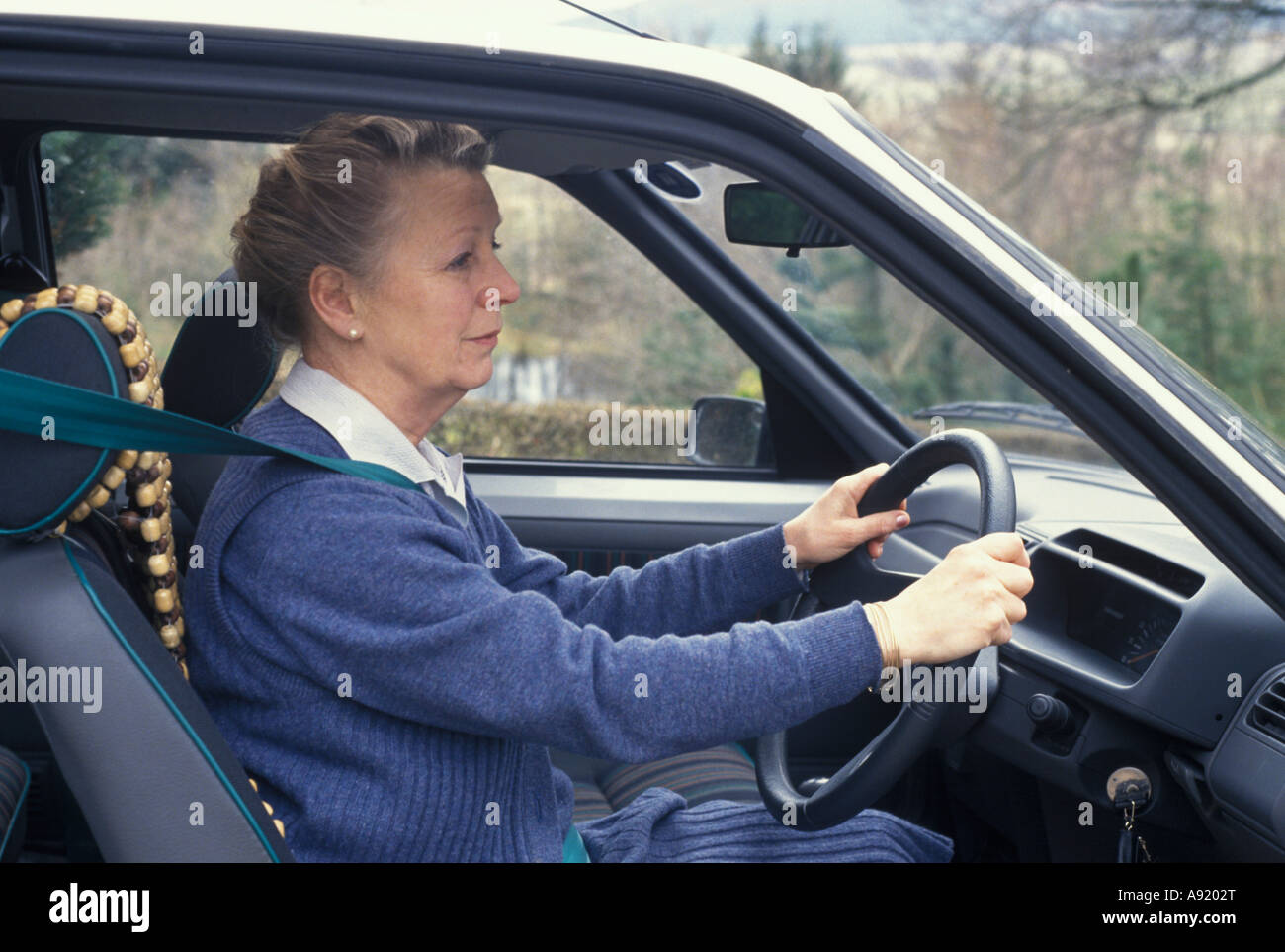 elderly woman driving Stock Photo - Alamy