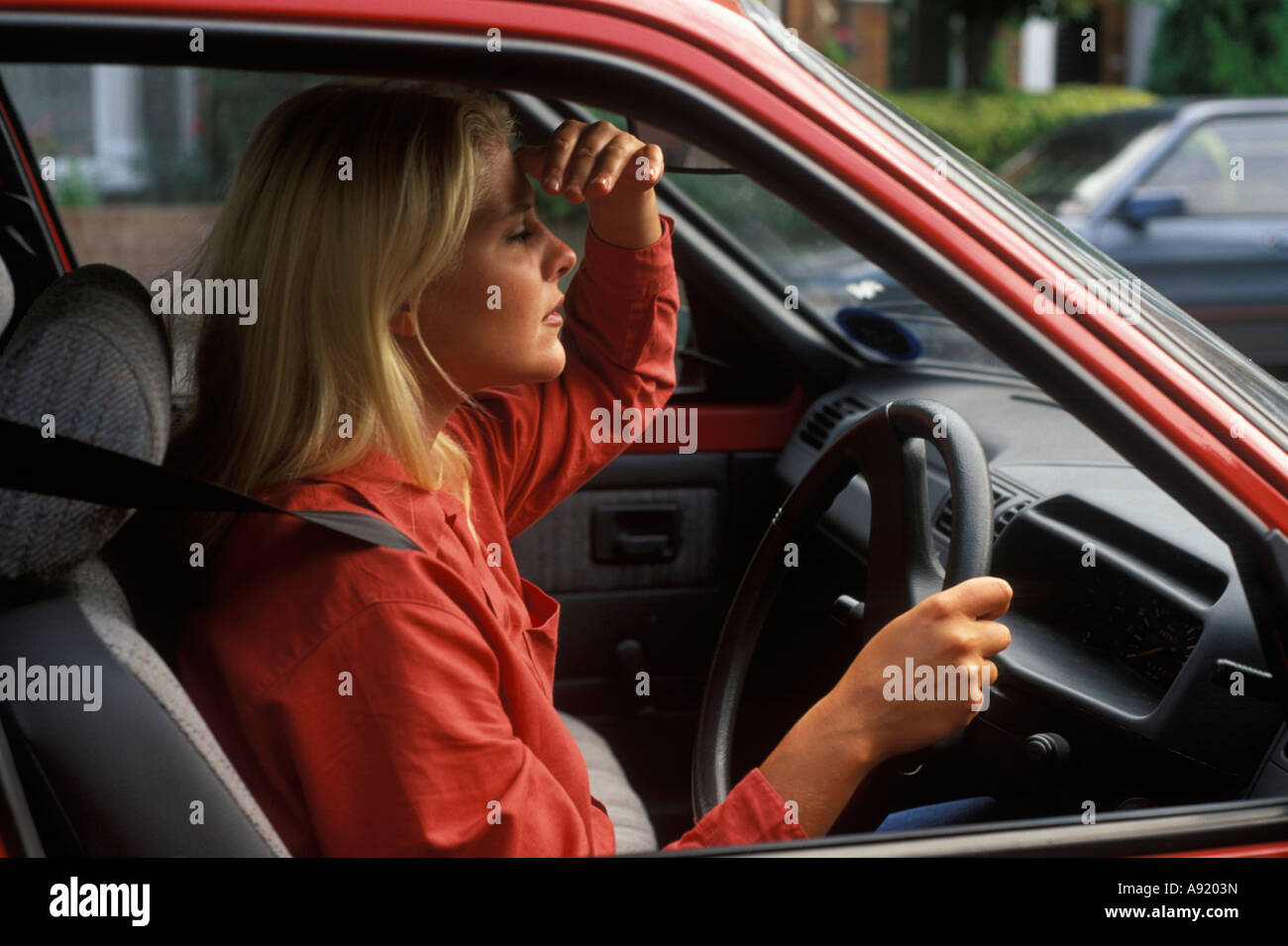 Squinting driving hi-res stock photography and images - Alamy