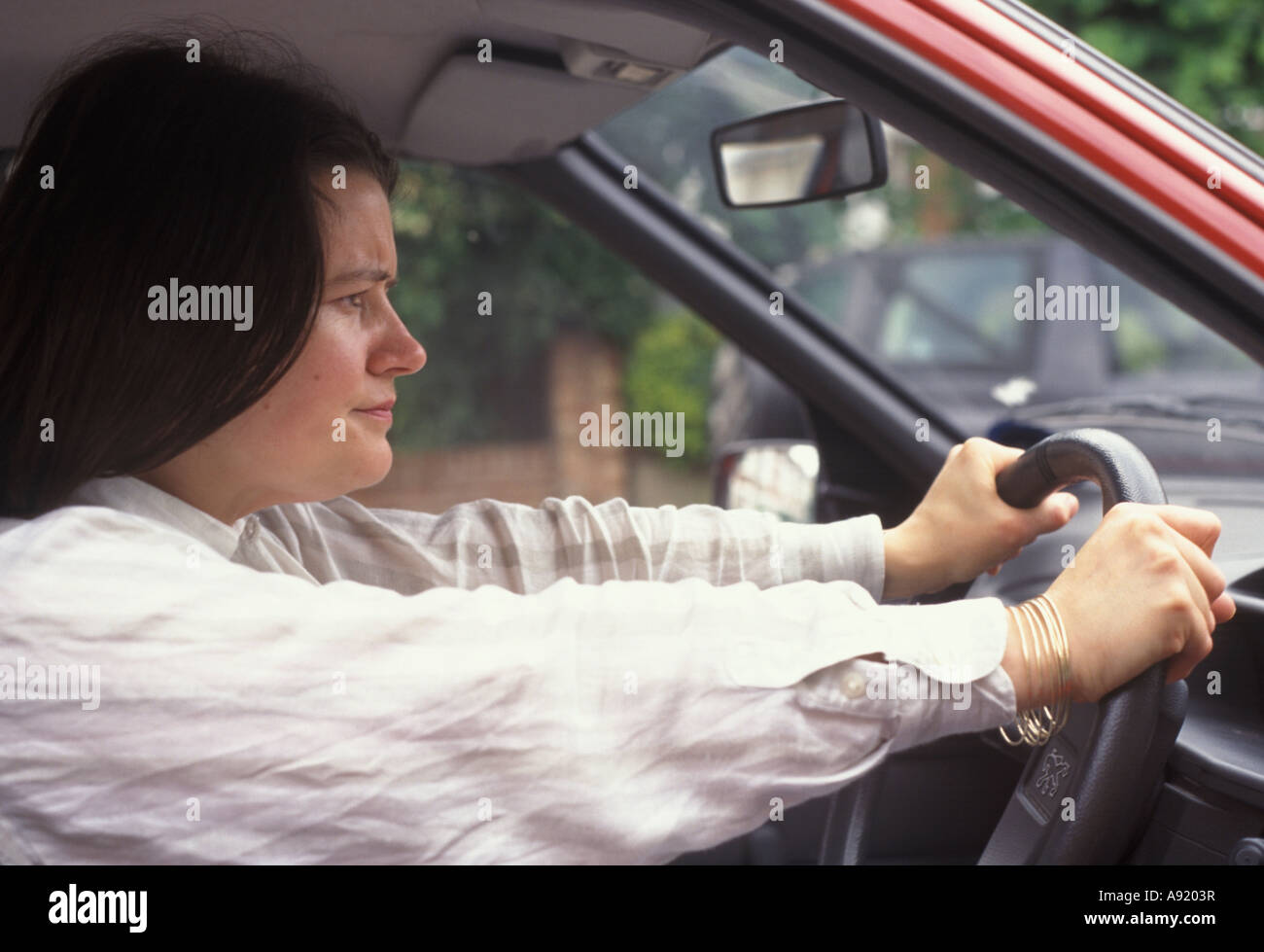 stressed woman driver Stock Photo - Alamy