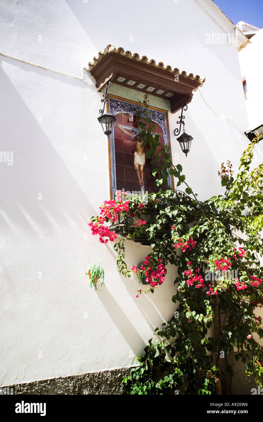 Spanish Church in Tarifa Andalucia with Bougainvillea growing on wall ...
