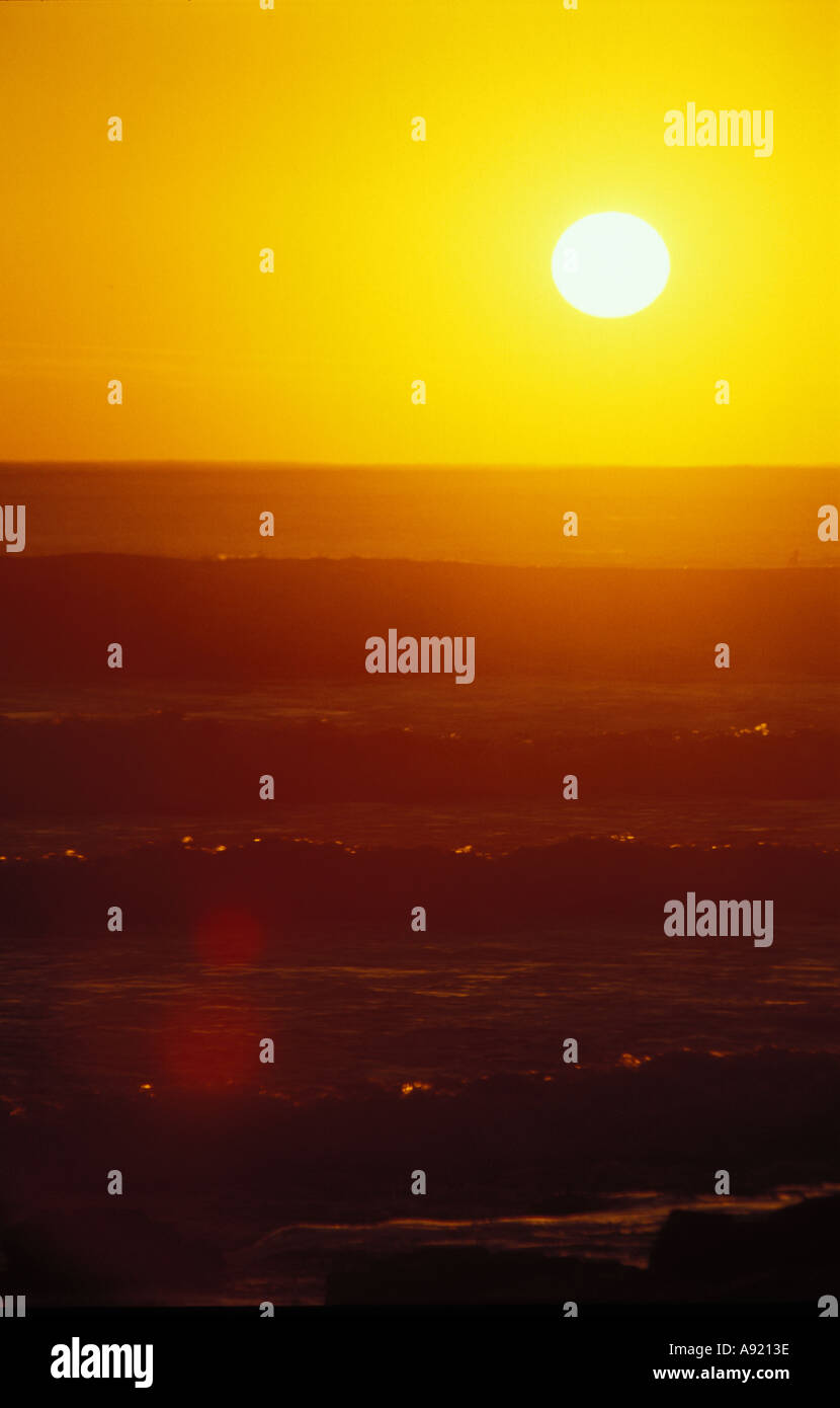 Sun over water Stock Photo - Alamy