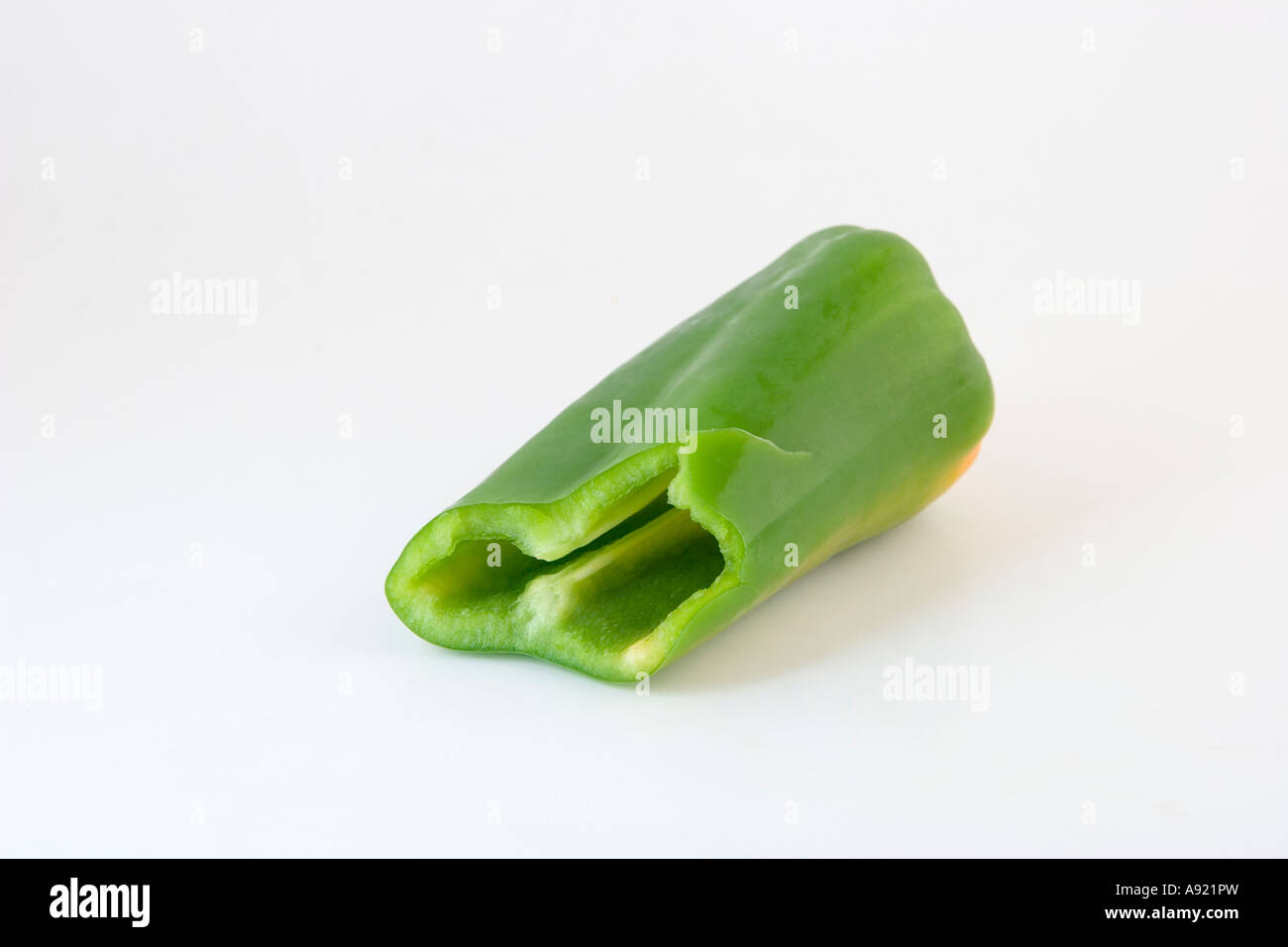 Broken Pepper on a white background Stock Photo - Alamy