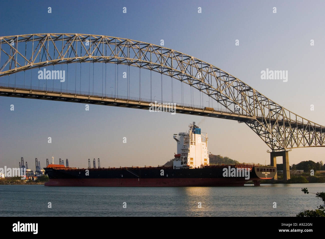 An oil tanker sails under Puente de las Americas, entering the Panama ...