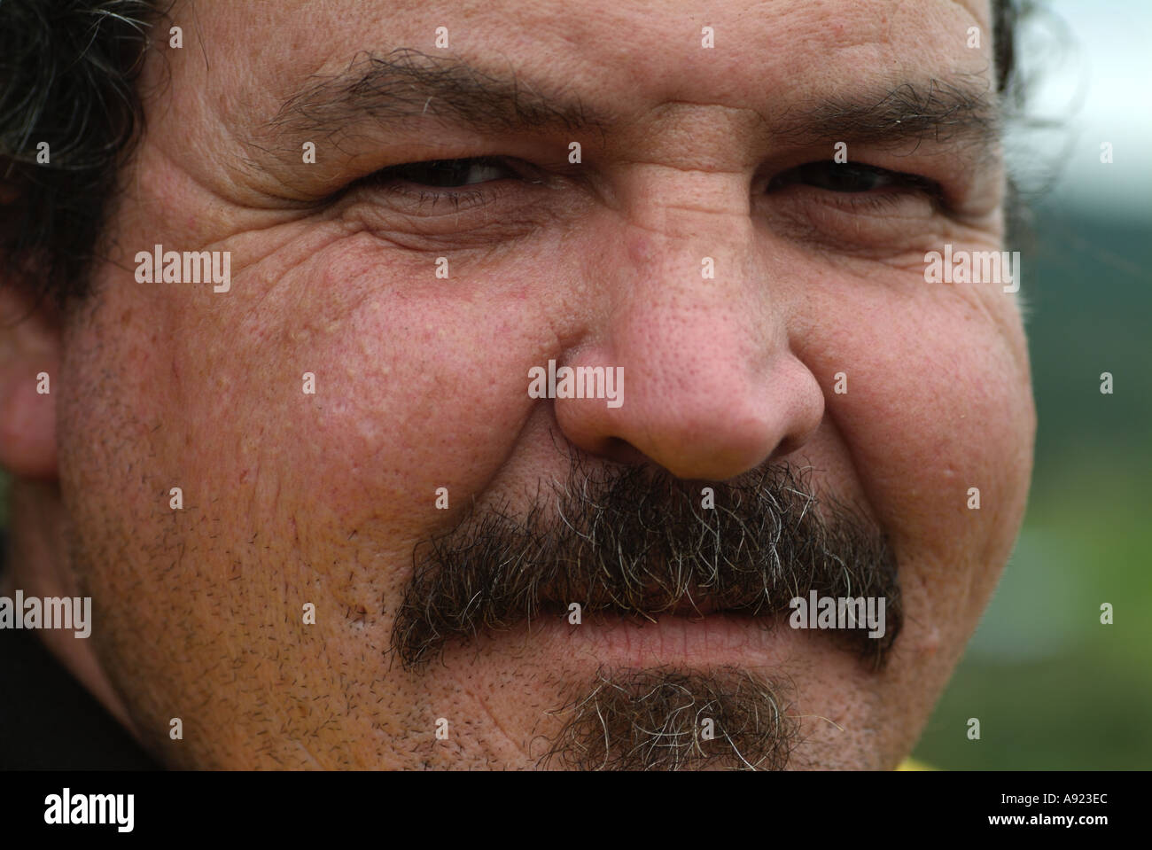 Tough face of a man that says you are my friend but I mean business ...