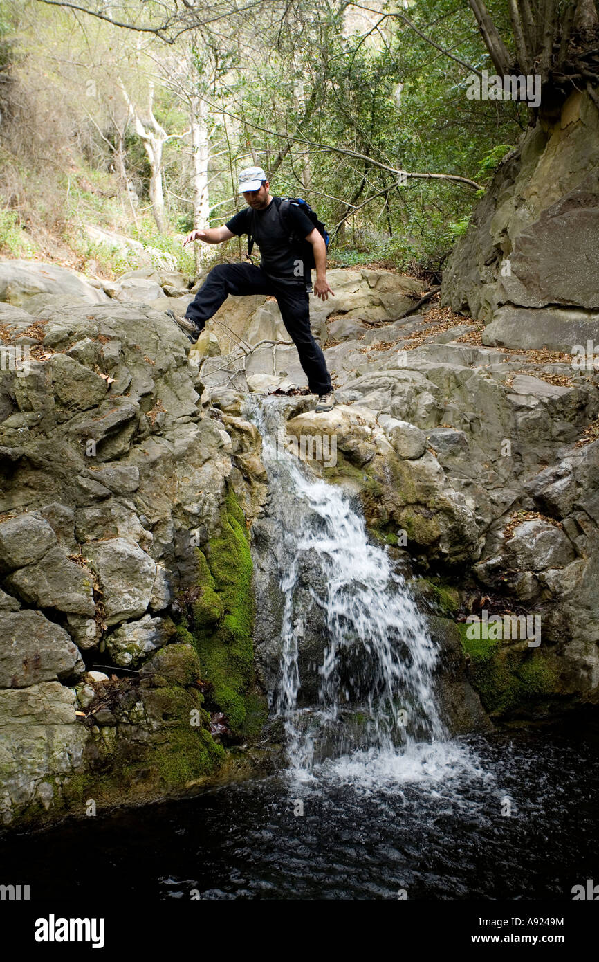 Hiker walking over a waterfall in Santa Barbara,CA Stock Photo - Alamy