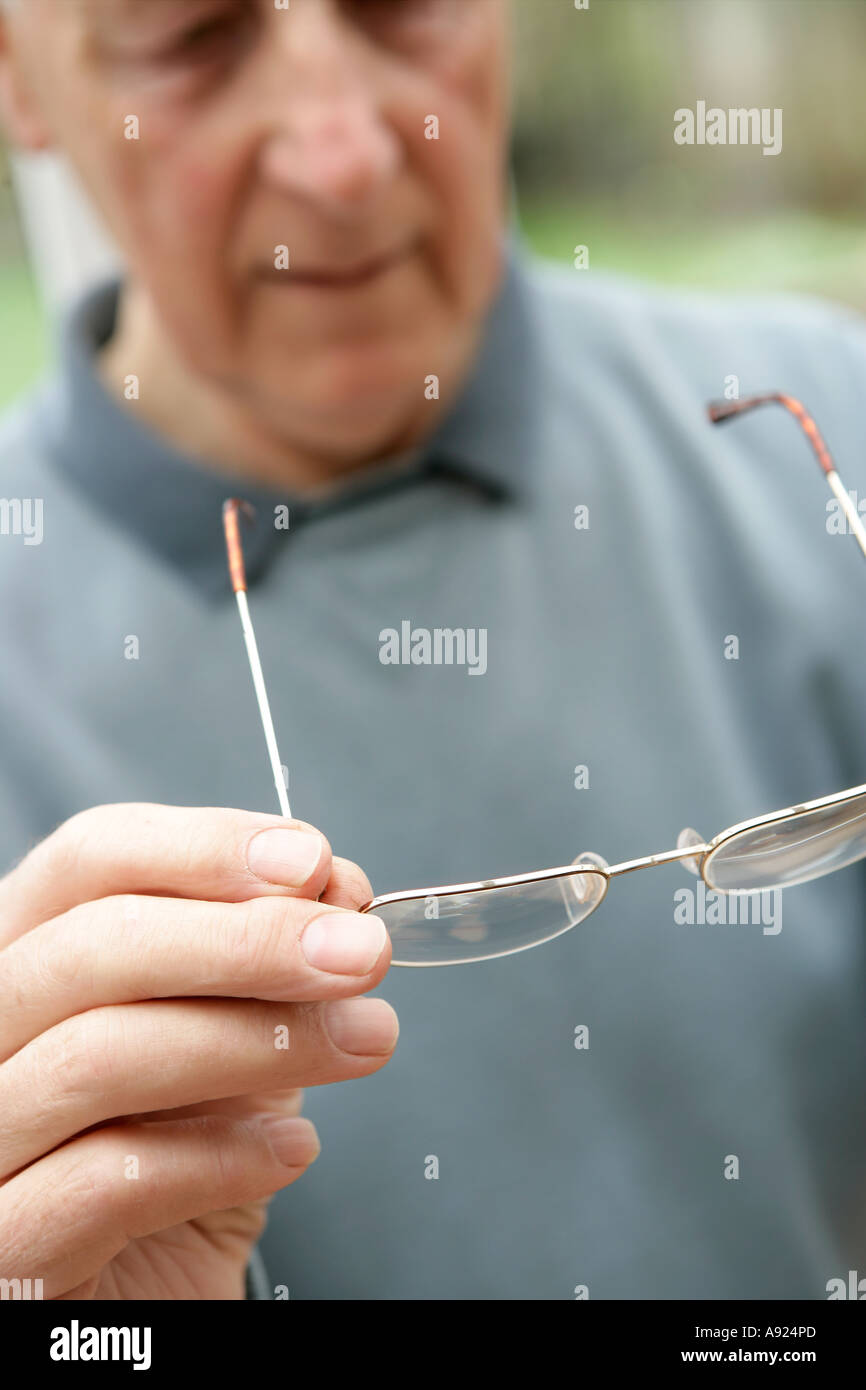 Elder grey haired man with glasses hi-res stock photography and images ...