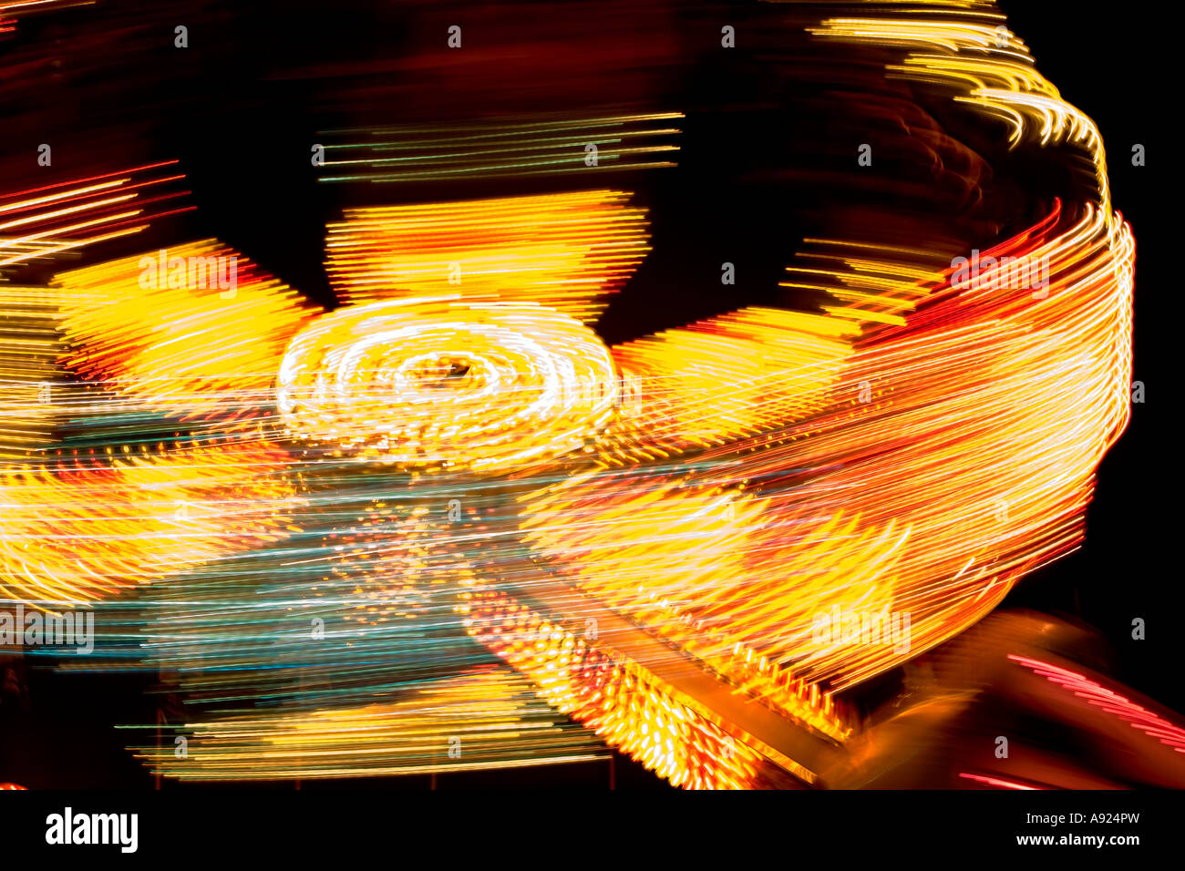 Spinning carnival ride Stock Photo - Alamy