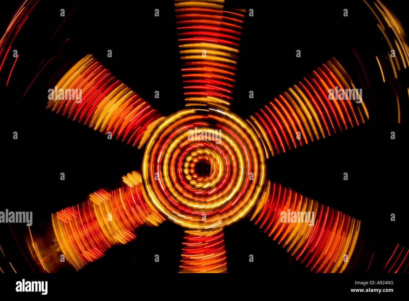 Spinning carnival ride Stock Photo - Alamy