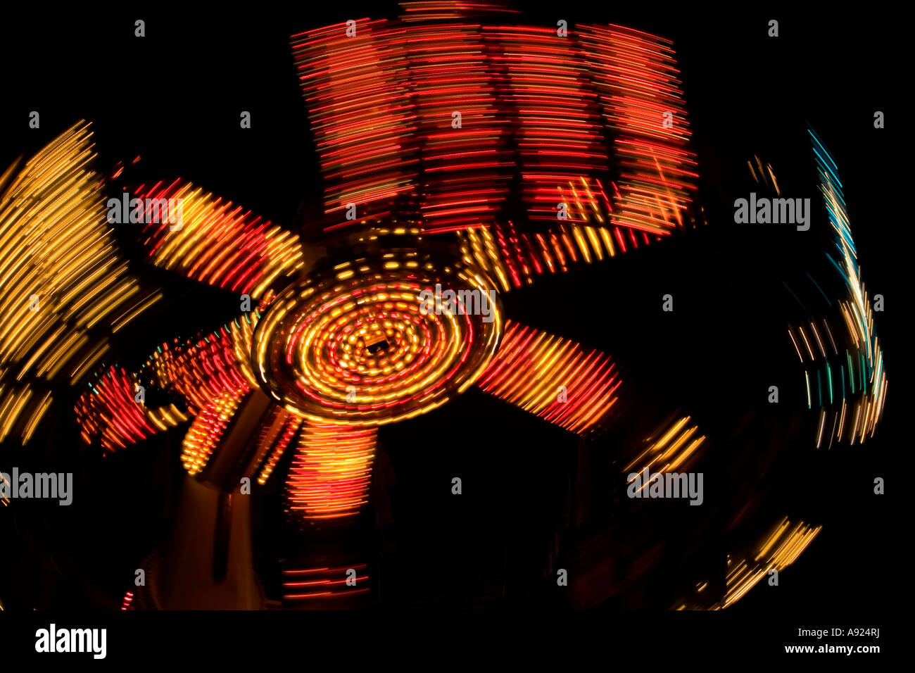 Spinning carnival ride Stock Photo - Alamy