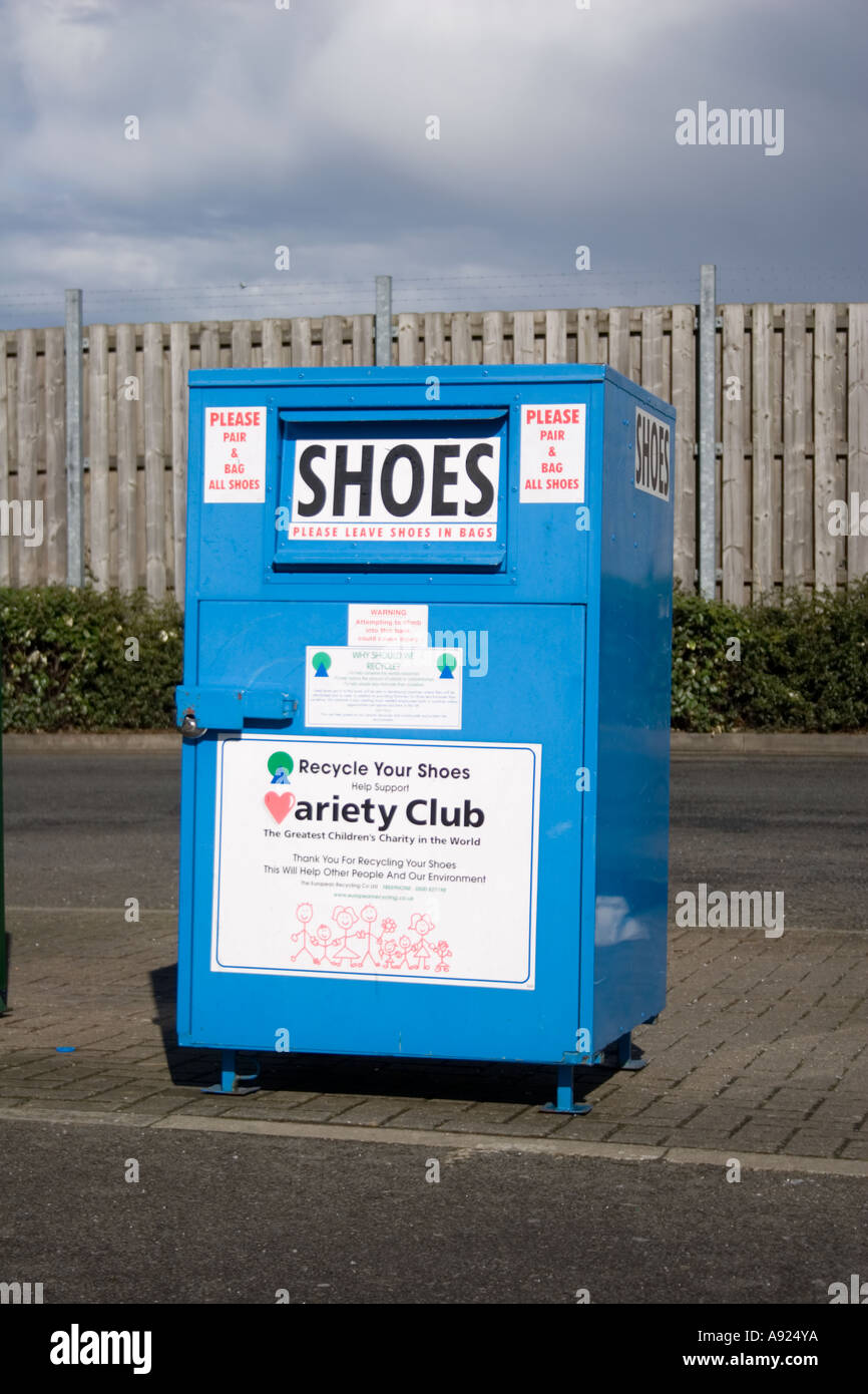 Charity shoe collection container Stock Photo - Alamy