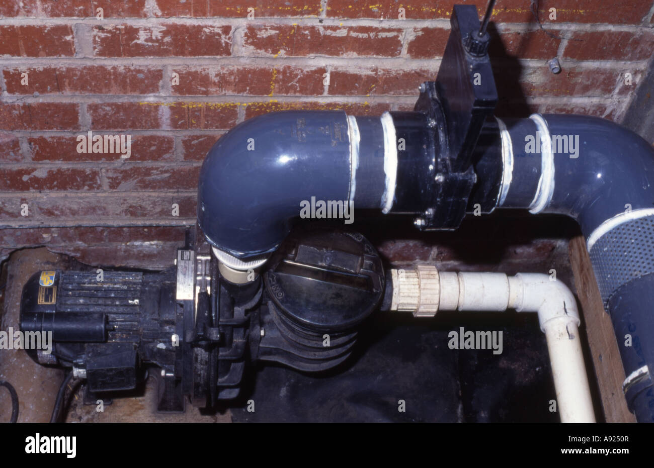 Pump to take Koi pond water to vortex and filters Stock Photo - Alamy