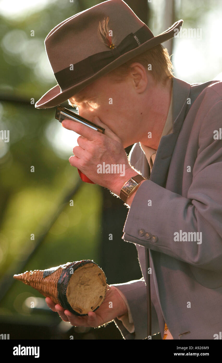 Man playing harmonica hi-res stock photography and images - Alamy