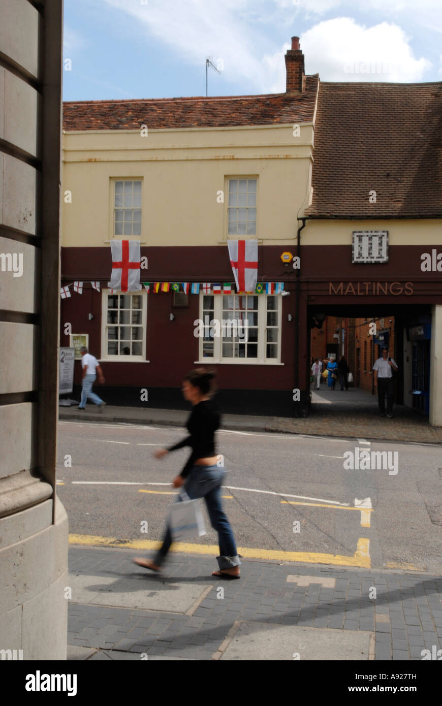 A shopper walks past the Maltings Shopping Centre in St Albans ...