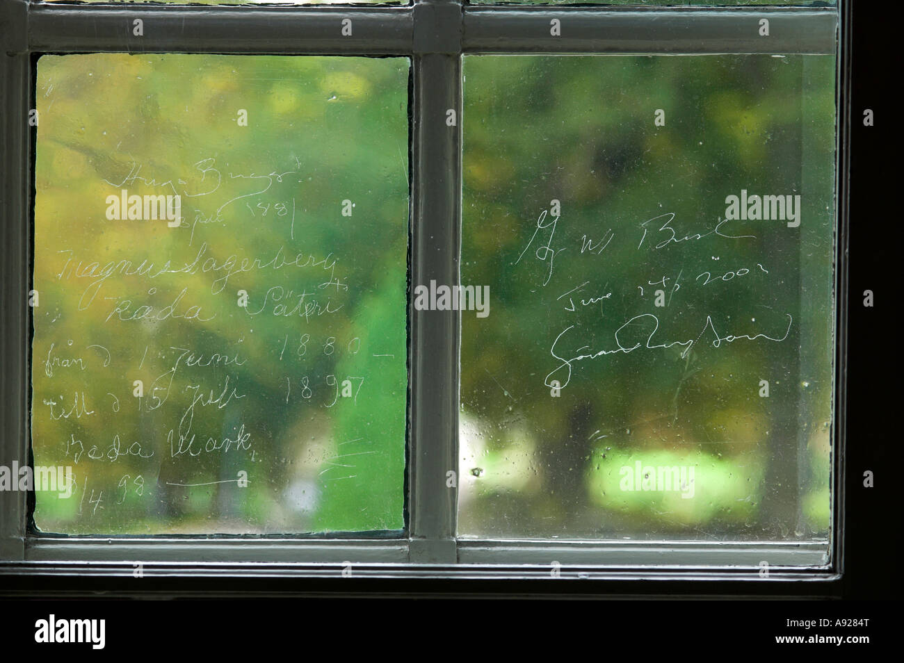 Engraved names on window panes. Sweden Stock Photo - Alamy