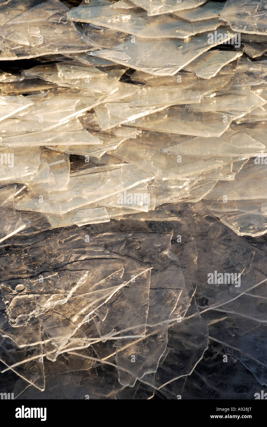 Ice on frozen lake Stock Photo - Alamy