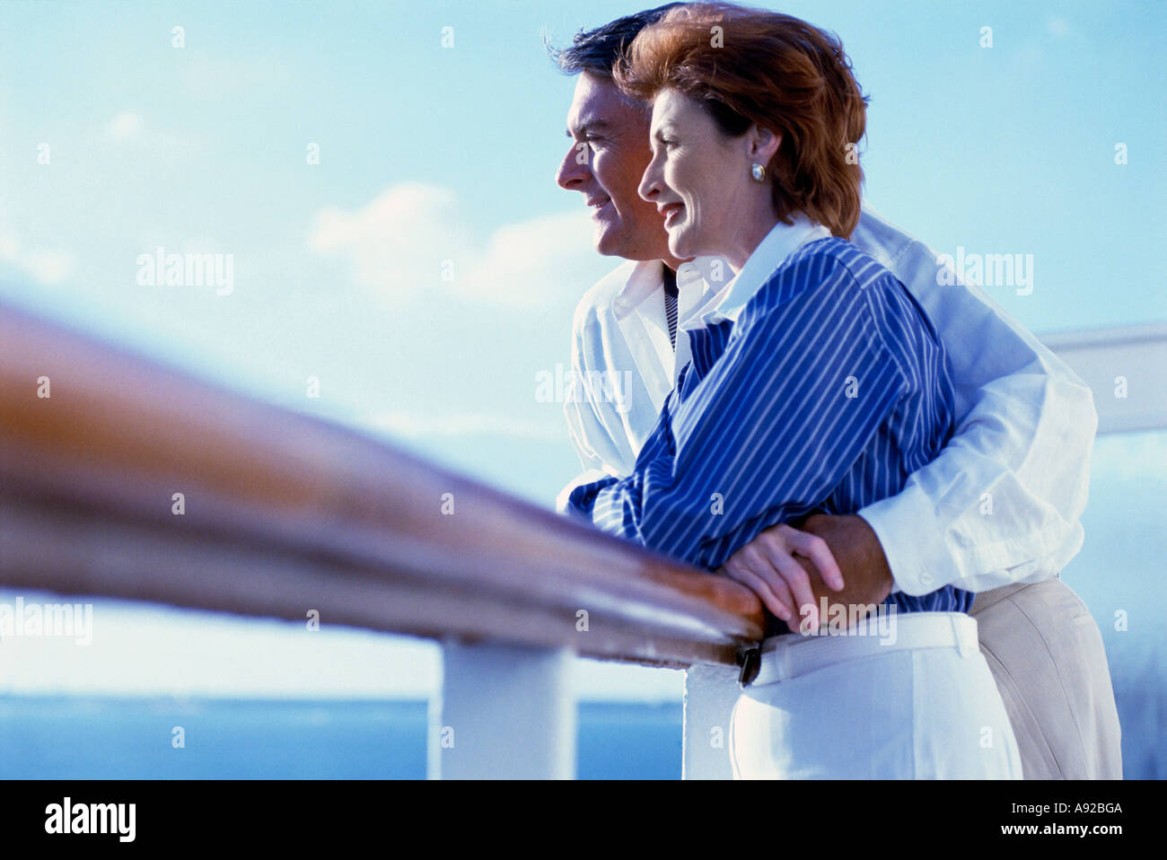 Couple leaning on rail of cruise ship hi-res stock photography and ...