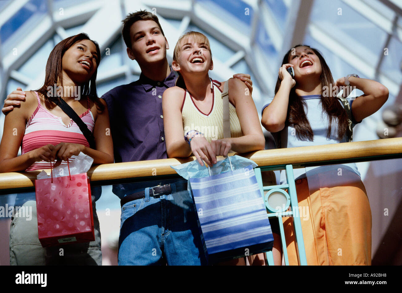 Teenagers shopping mall boy girl hi-res stock photography and images ...