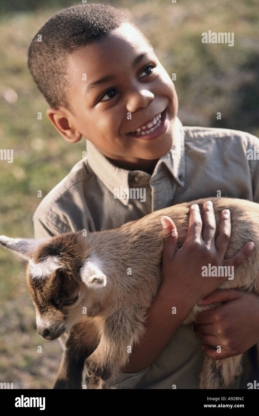 Boy with lamb hi-res stock photography and images - Alamy
