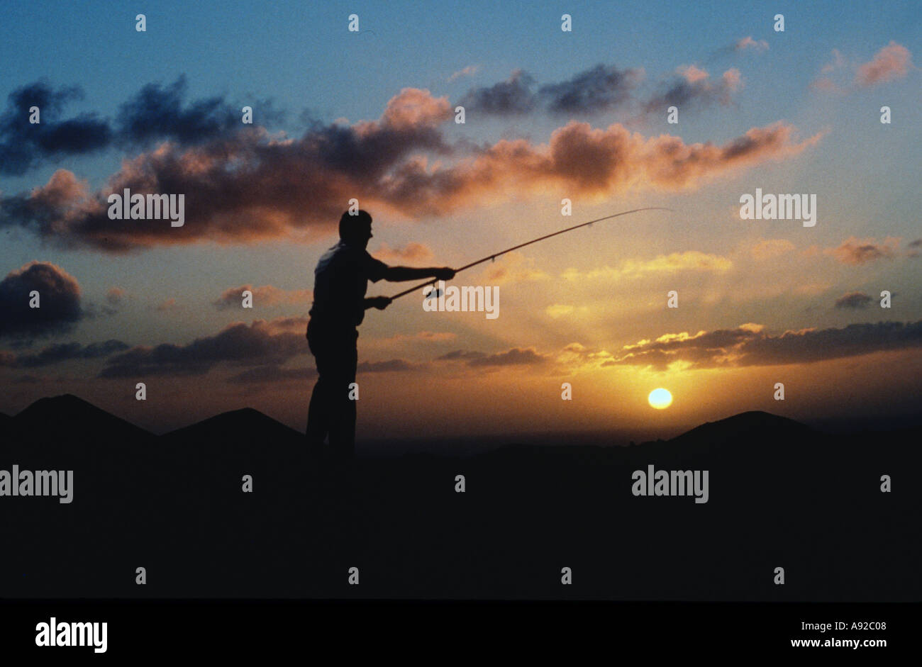 fisherman in the sundown angle fishing rod tackle hook catching ...