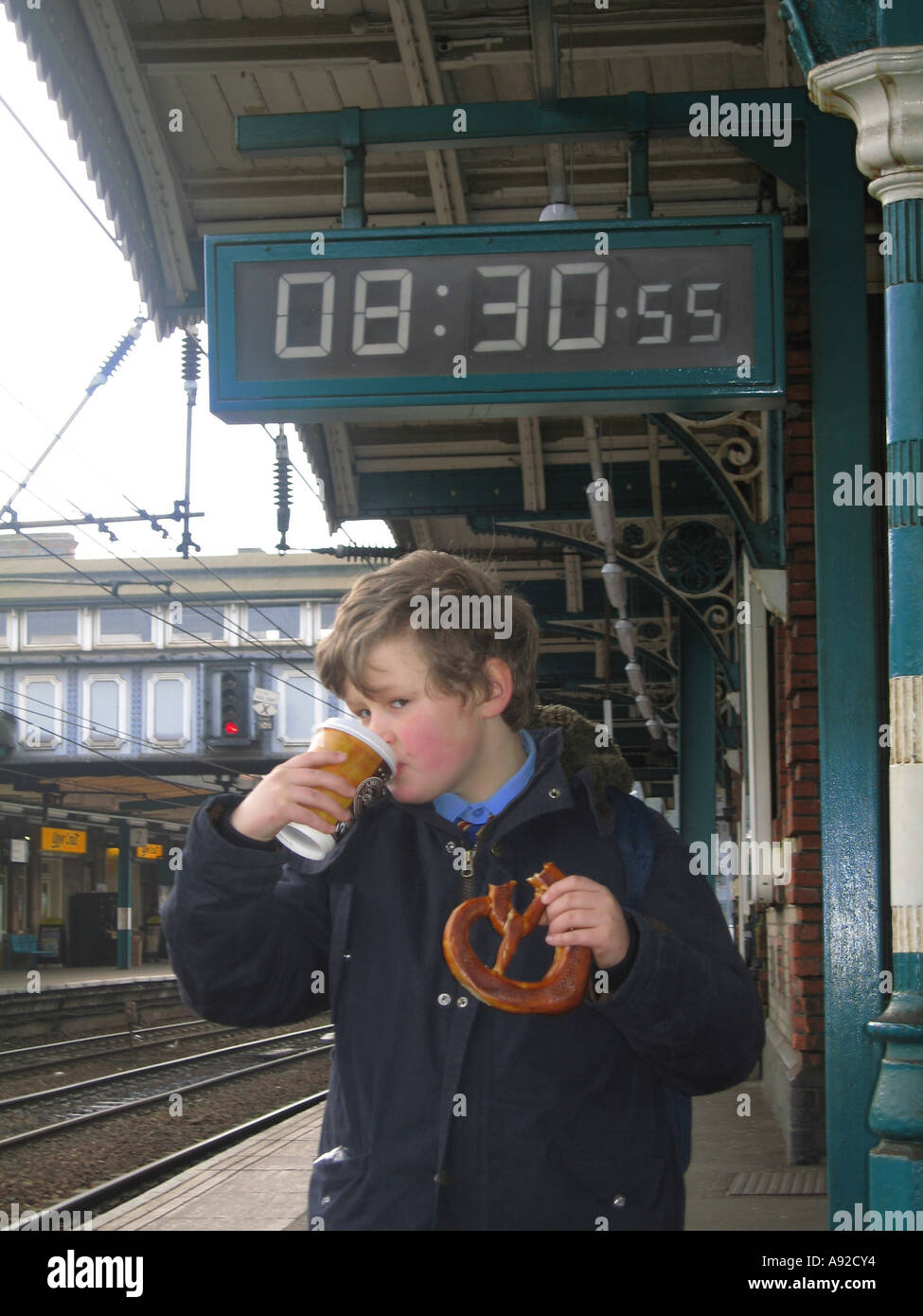 Boy on train platform hi-res stock photography and images - Alamy