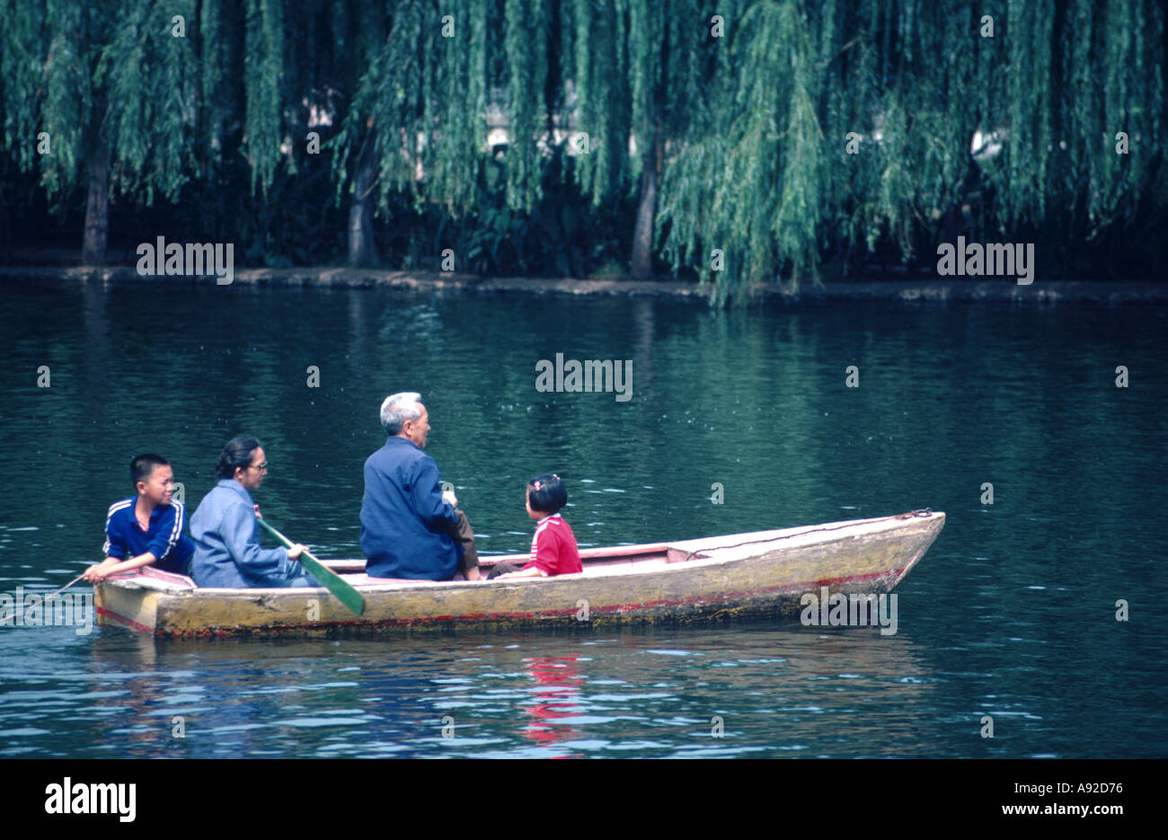 china people rowing on sea in park in beijing Stock Photo - Alamy