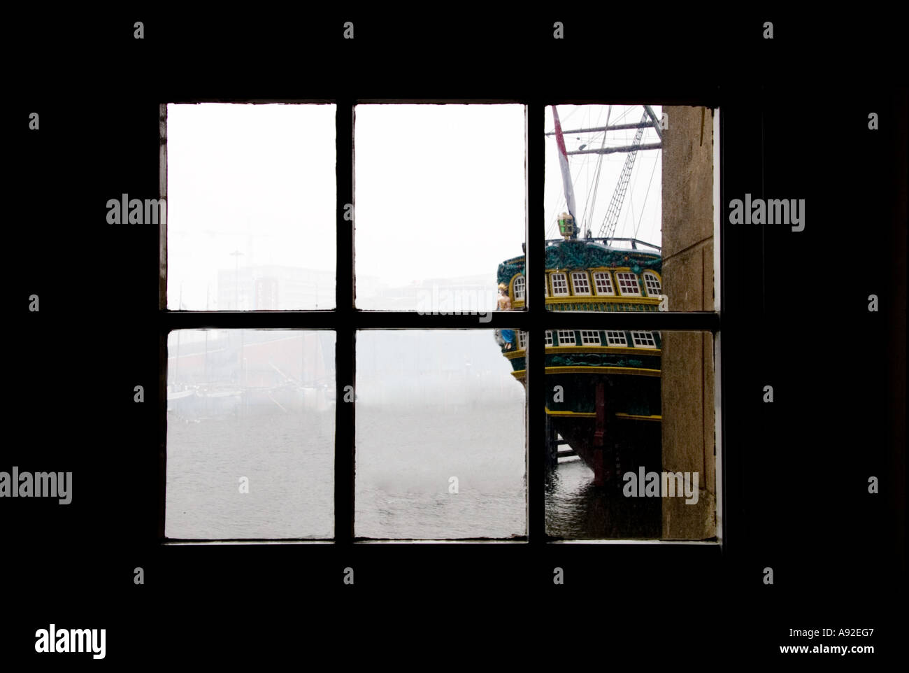 Historic sailing ship viewed from a multi paned window Stock Photo - Alamy