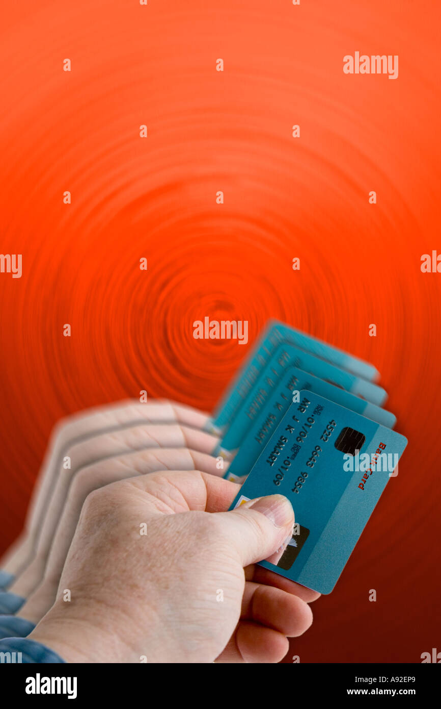 Hand holding bank card Stock Photo - Alamy