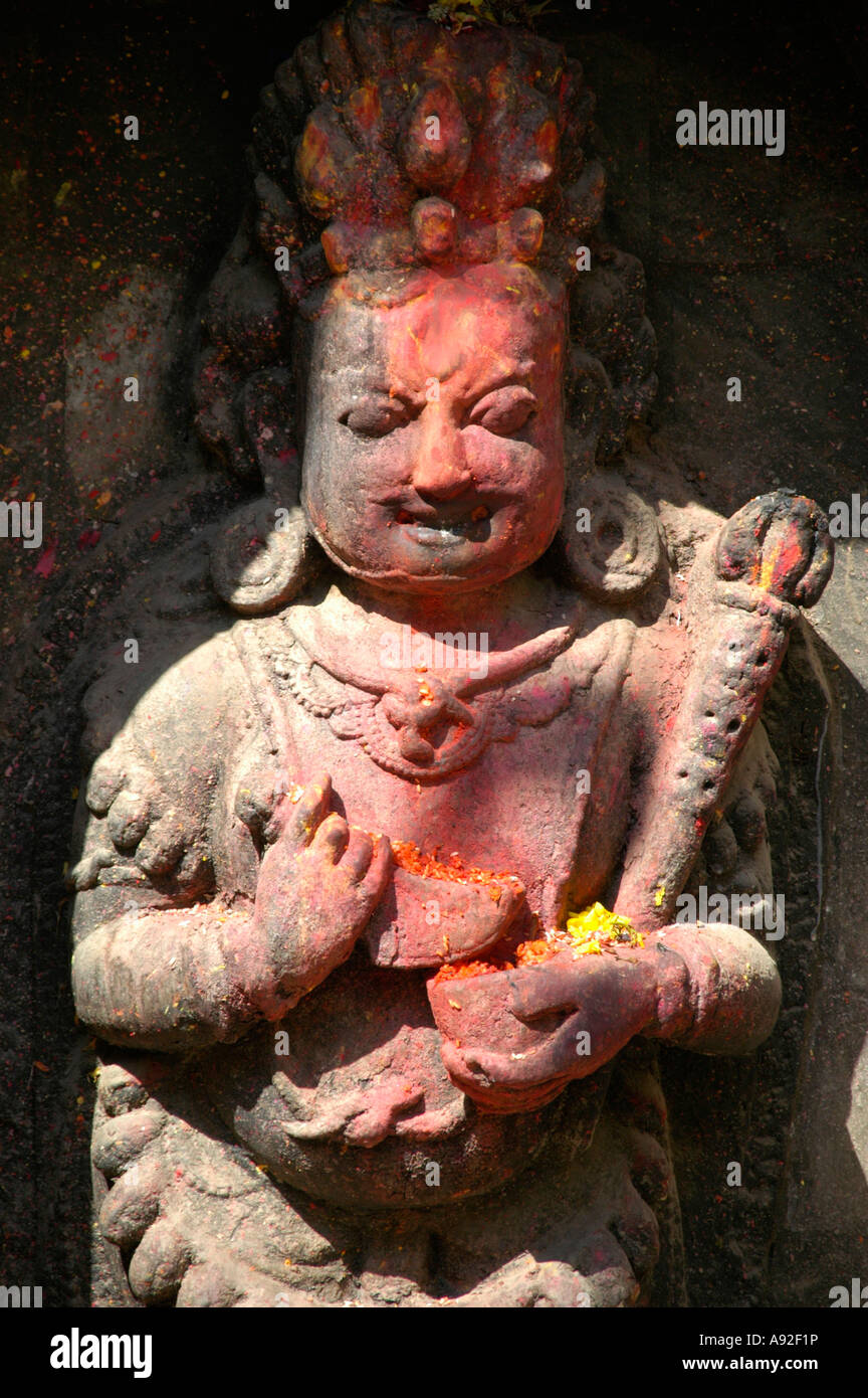 Old relief figure of god Vishnu with red paint Kathmandu Nepal Stock ...