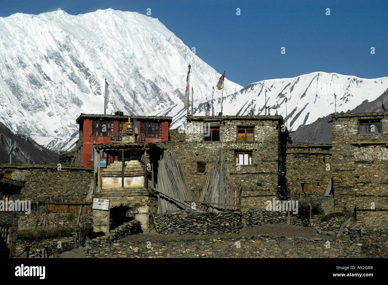 Unique gate to village Khangsar with stone houses and ice-capped ...