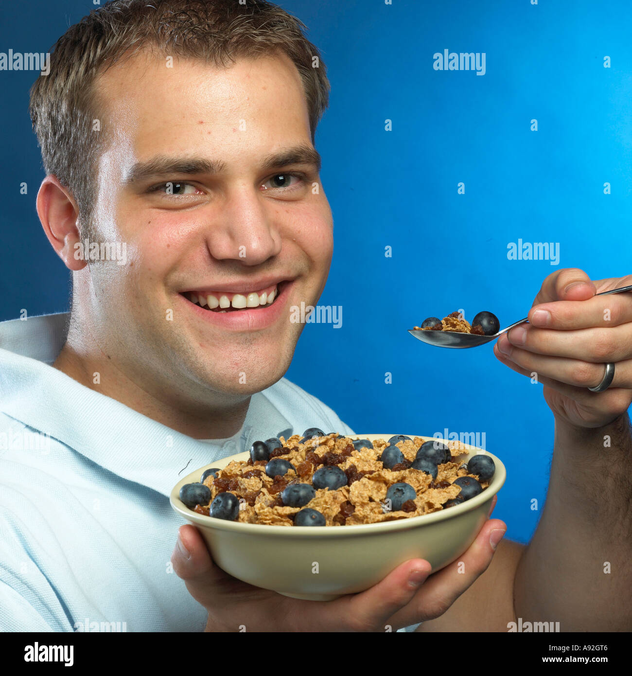 Man eating corn flakes hi-res stock photography and images - Alamy