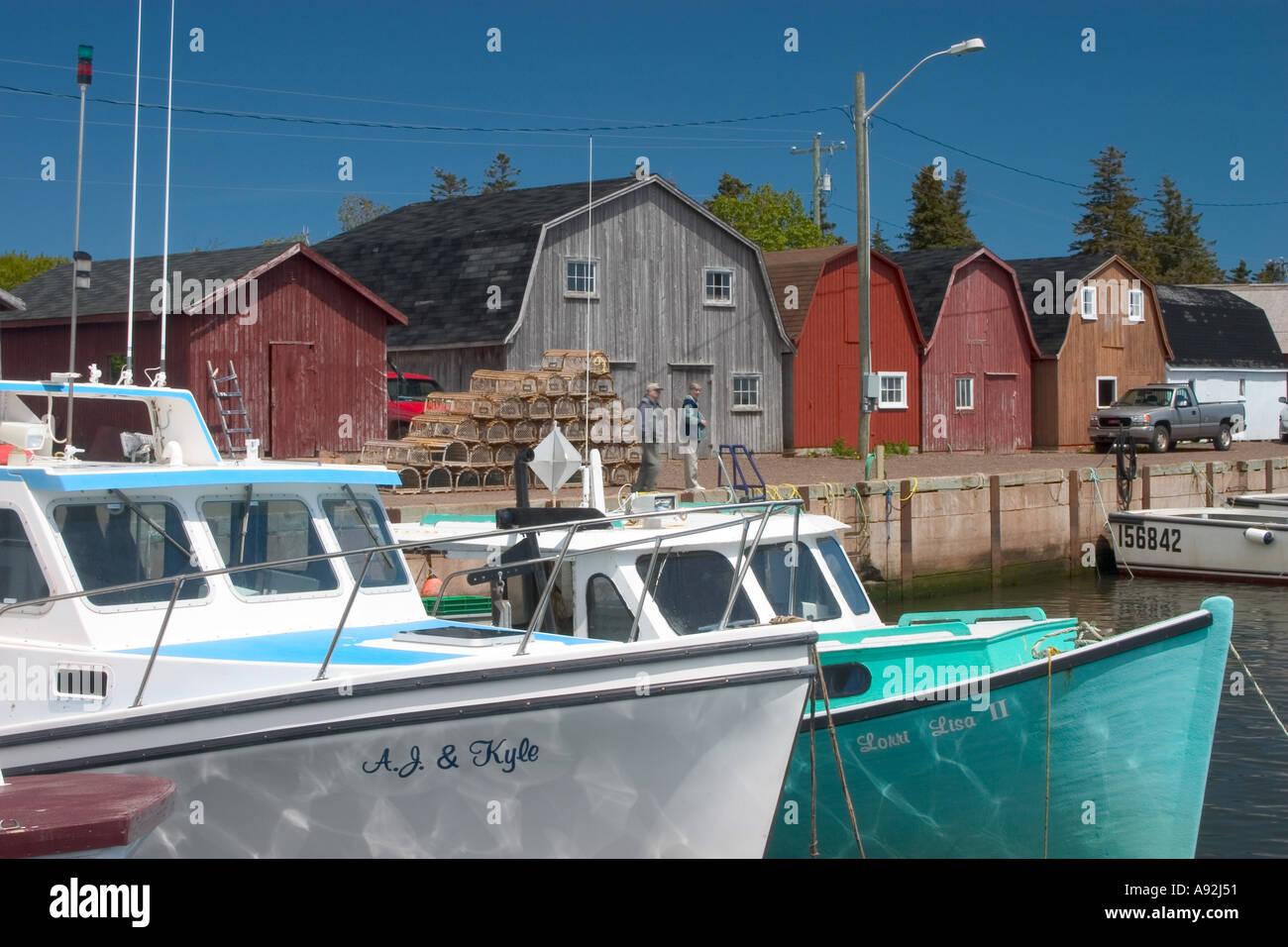 NA, Canada, Prince Edward Island, Malpeque Harbour. Fish sheds and ...