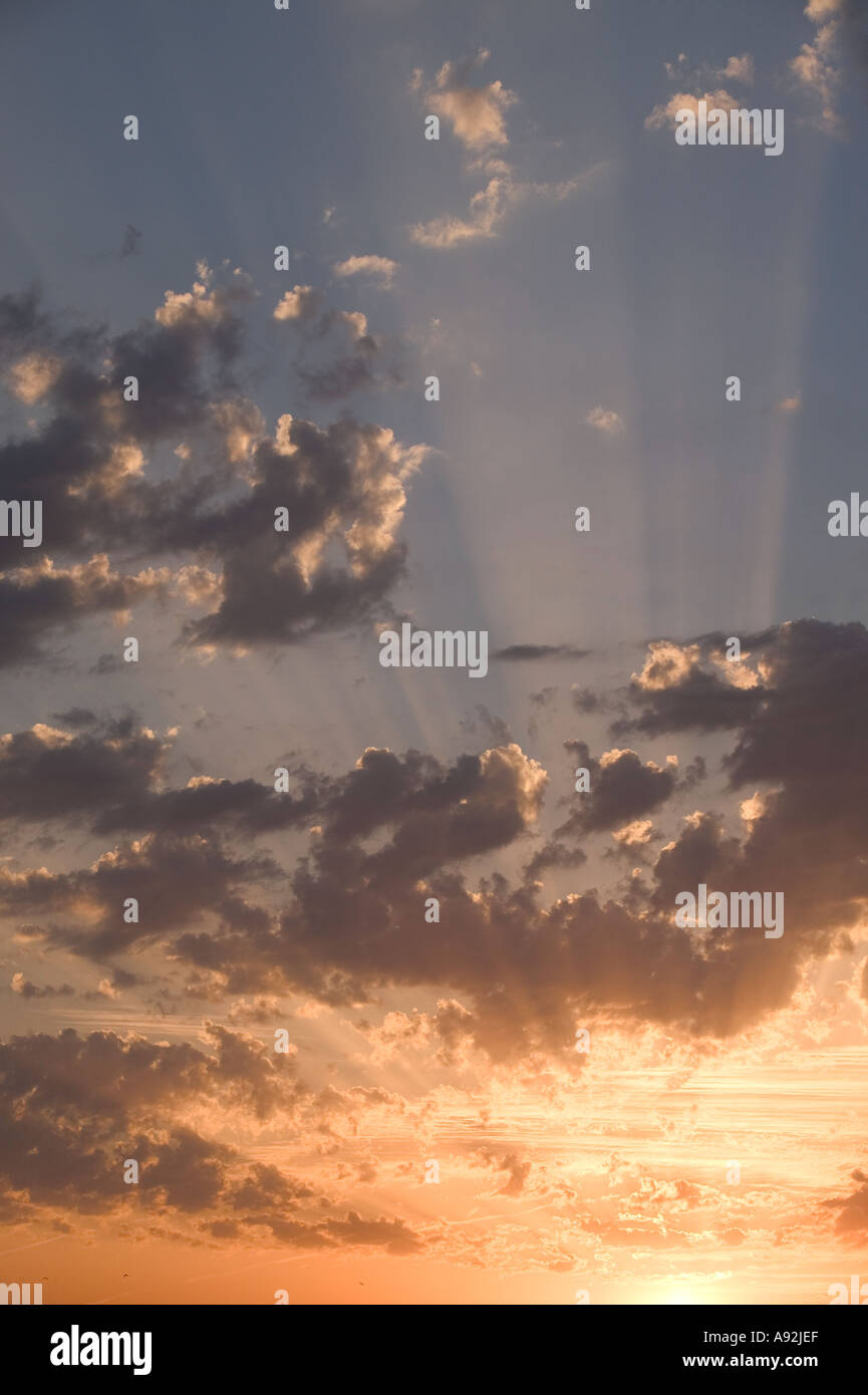 Jacobs ladders shafts of sunlight at sunset Stock Photo - Alamy