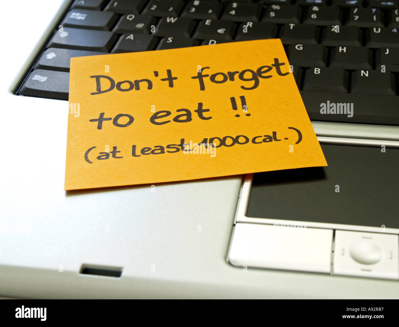 memo note on notebook, Don┤t forget to eat (at least 1000 cal Stock ...