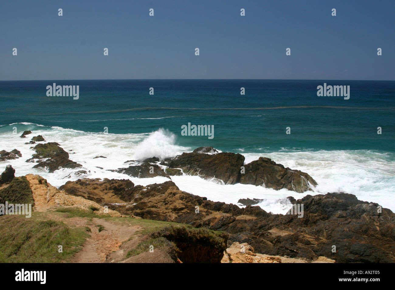 Waves hitting the cliffs on the eastern most point of the Australian ...