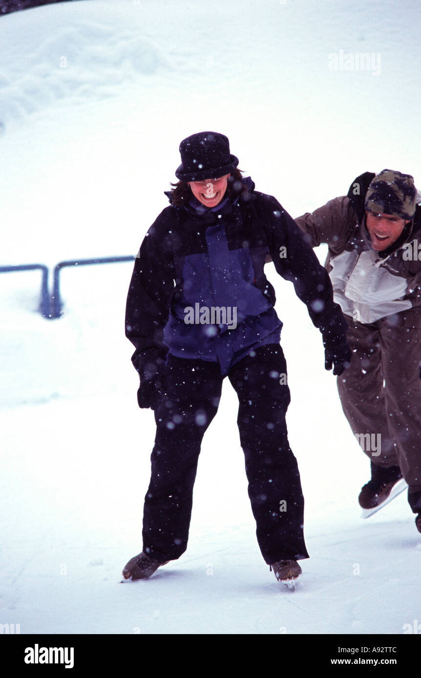 Man and woman skating push hi-res stock photography and images - Alamy