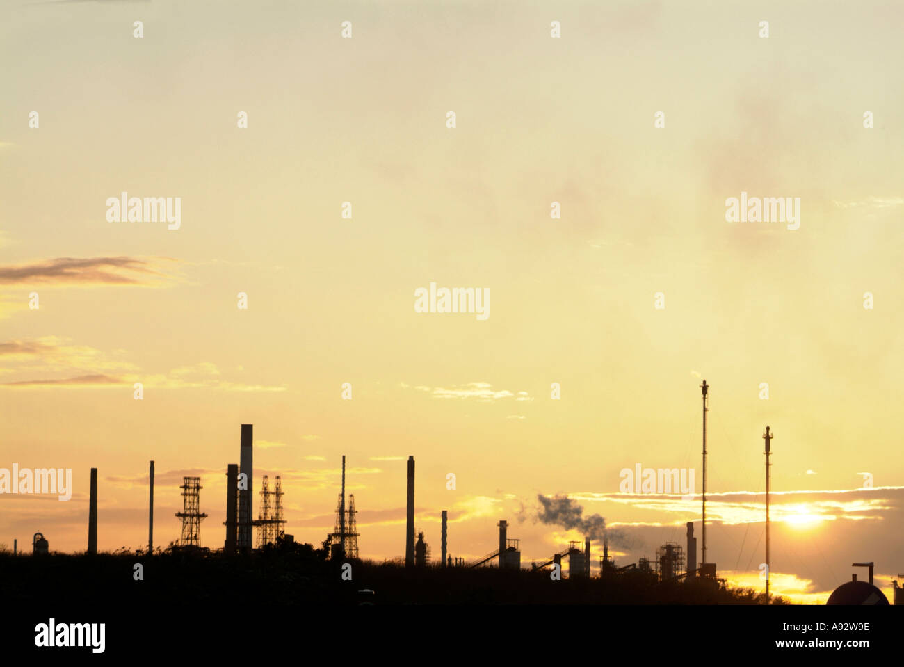oil refinery petrol petrochemical industry industrial skyline sunset ...