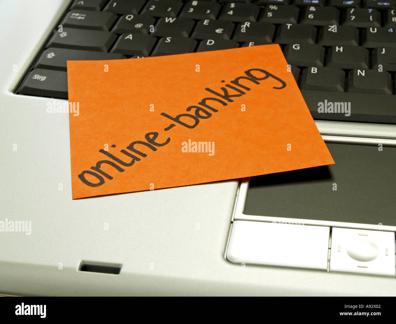 memo note on notebook online banking Stock Photo - Alamy