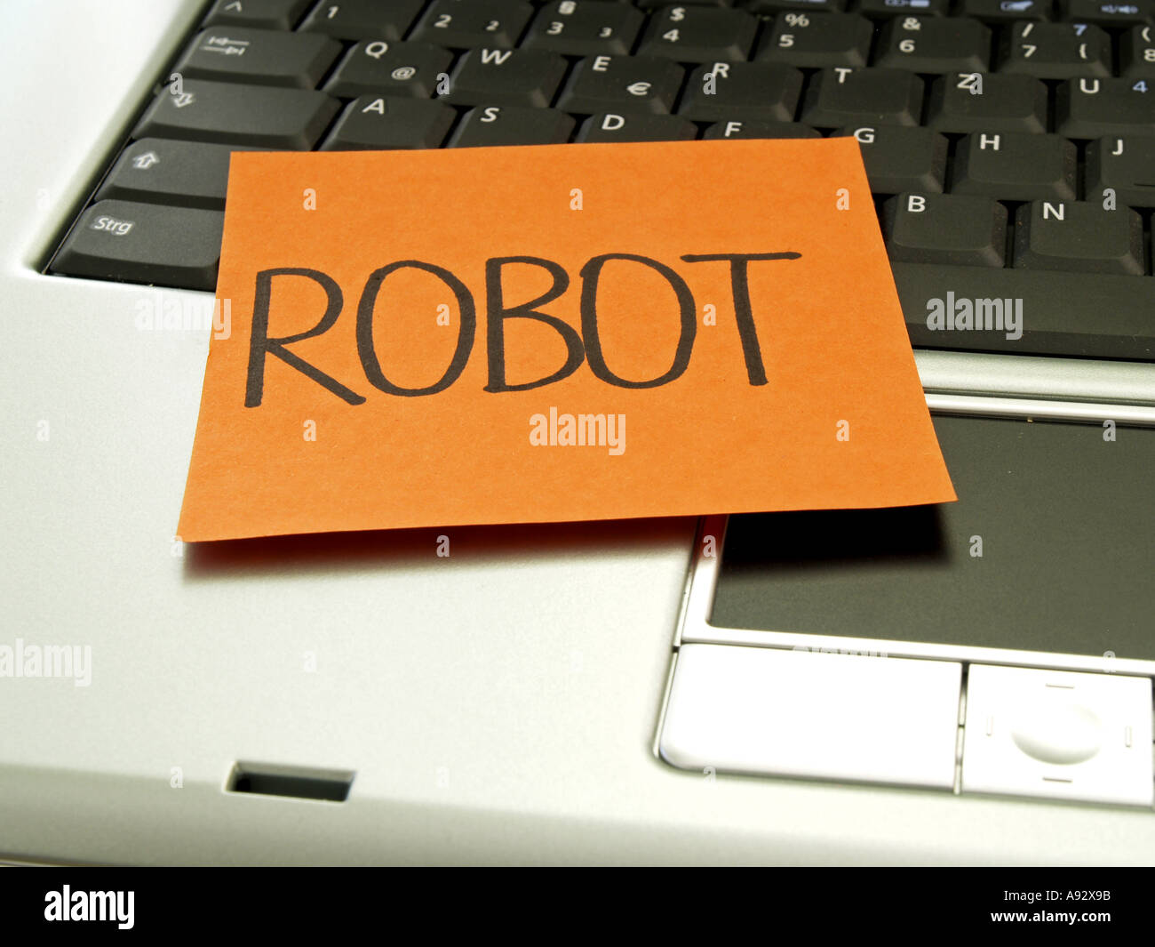 memo note on notebook, robot Stock Photo - Alamy