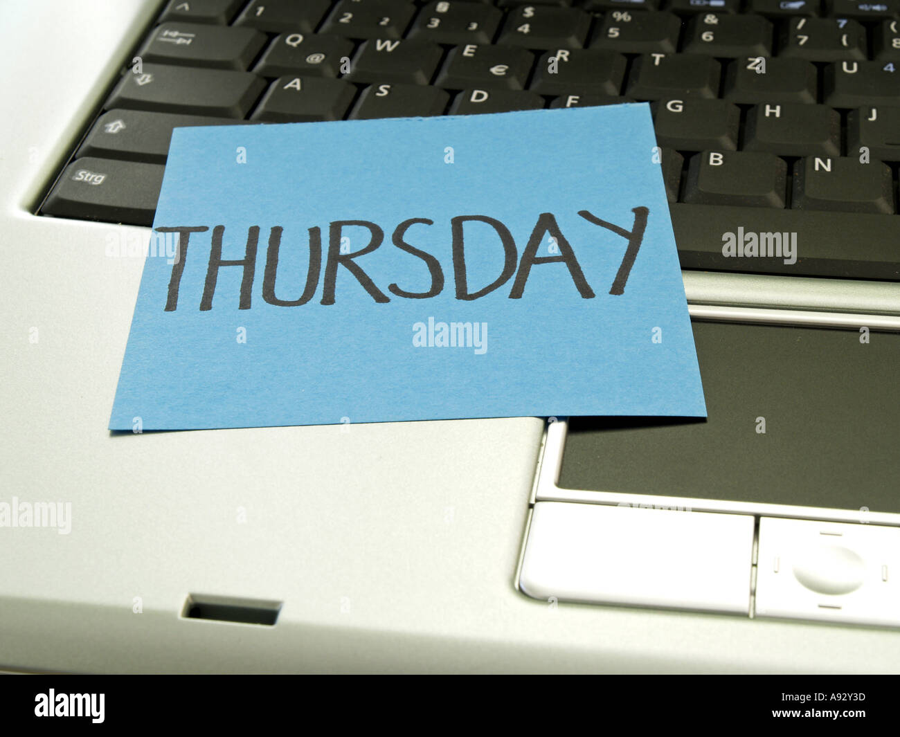 memo note on notebook, Thursday Stock Photo - Alamy